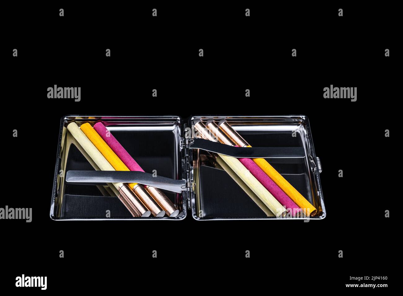 Metal tobacco box with color cigarettes Stock Photo - Alamy
