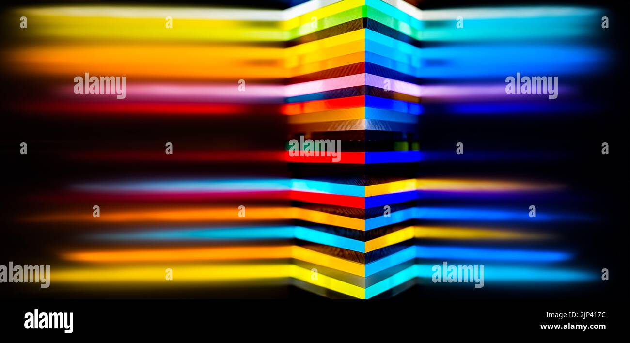 light through Stack of different colours Cast Acrylic Sheet on black ...