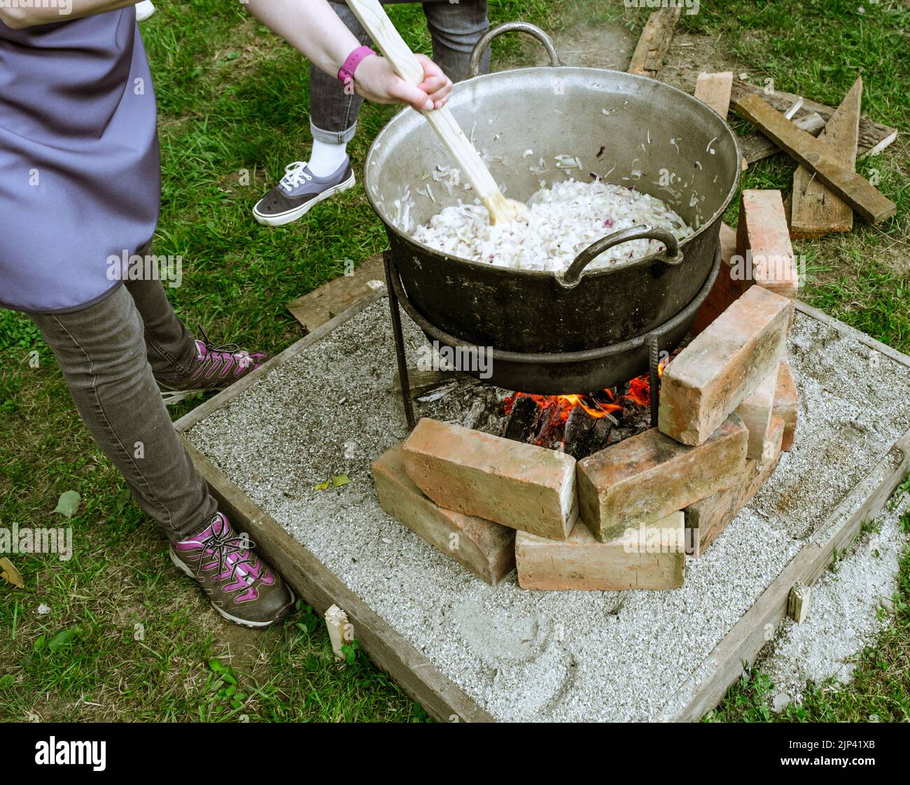 Romanian traditional food prepared at the cauldron on the open fire ...
