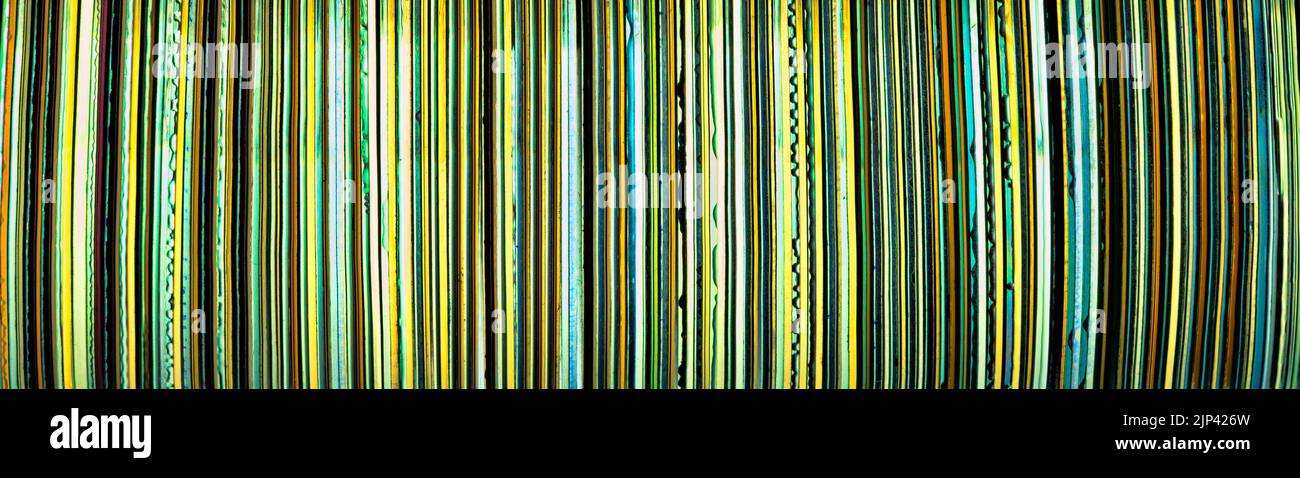 Side view of a bunch of compact discs Stock Photo - Alamy