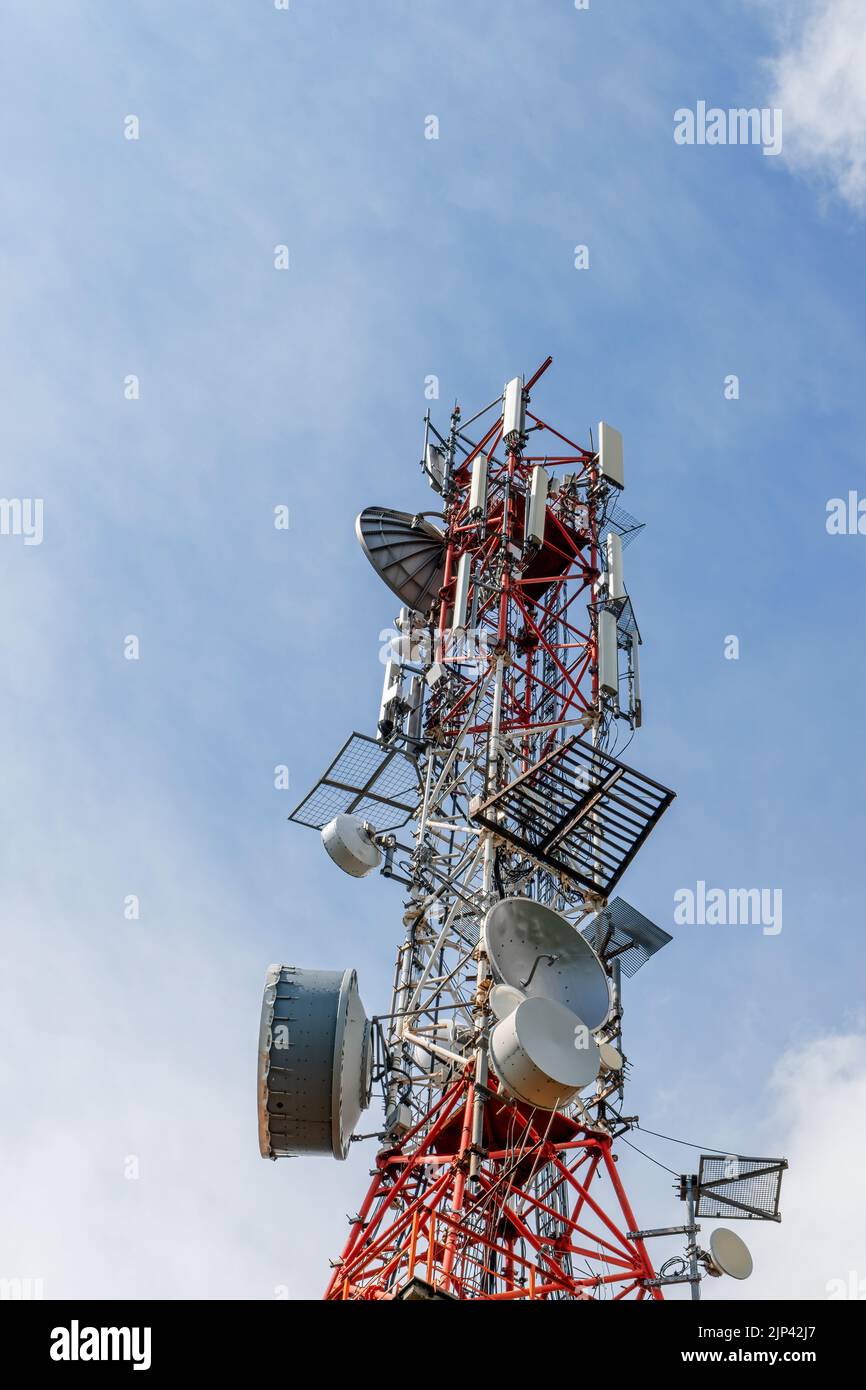 Telecomunication tower with dish and mobile antenas Stock Photo - Alamy
