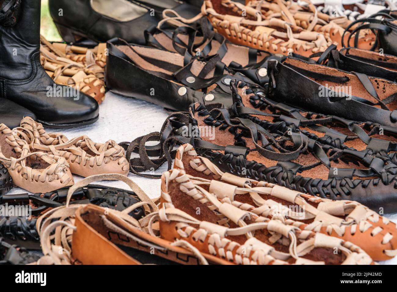 traditional romanian peasant leather shoes Stock Photo - Alamy
