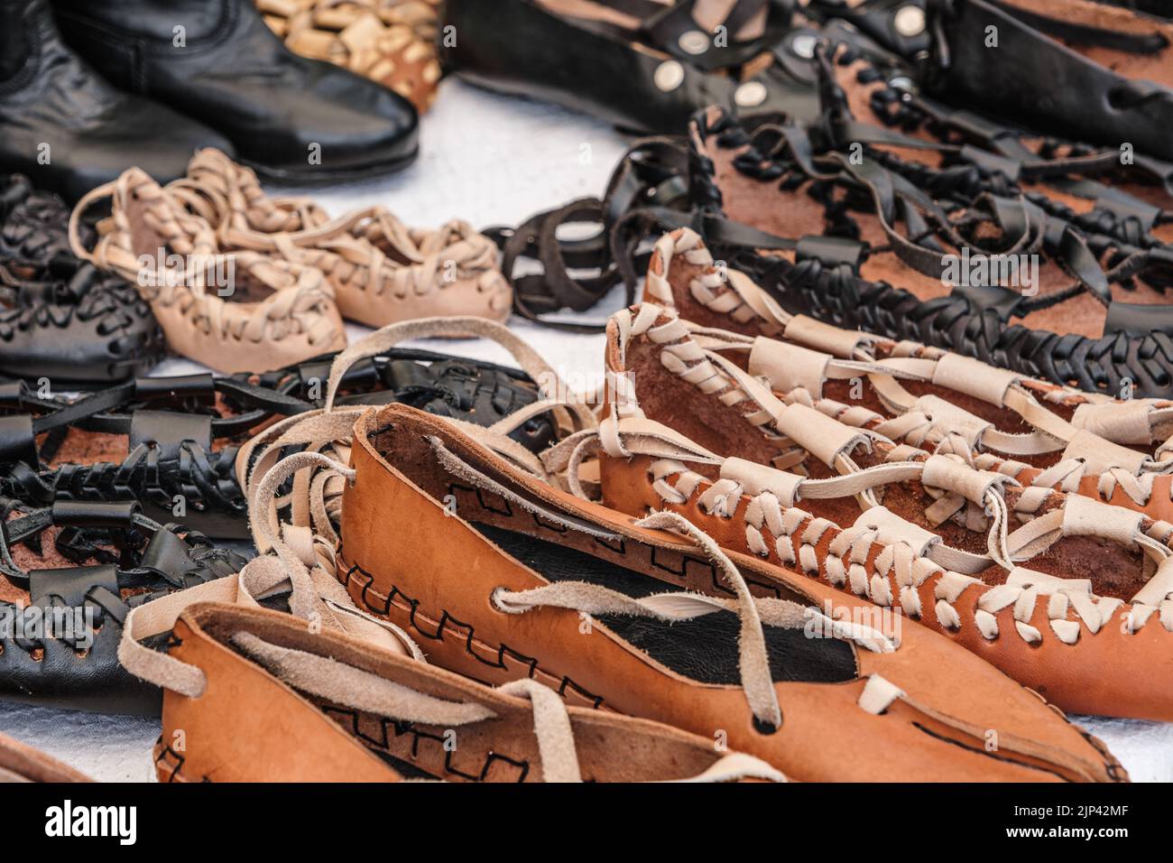 traditional romanian peasant leather shoes Stock Photo - Alamy