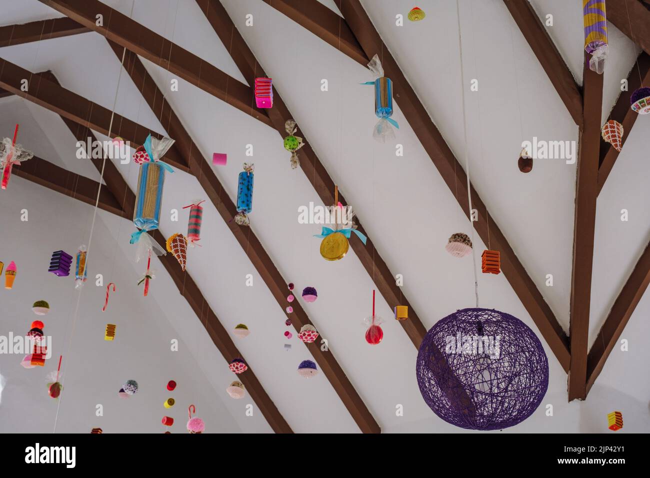 various ornaments hanging from the ceiling Stock Photo - Alamy