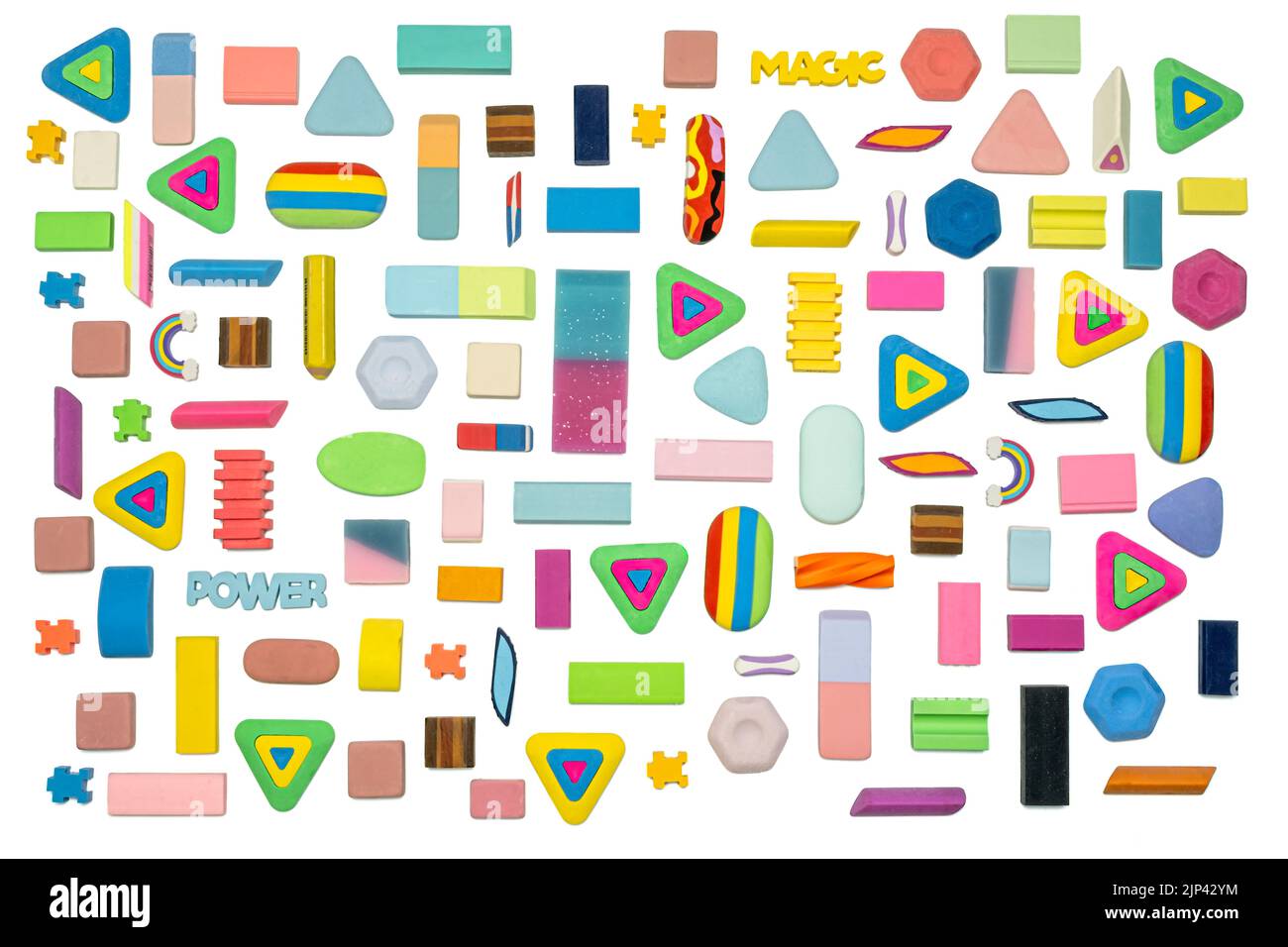 various shapes and colors of erasers arranged isolated on white ...
