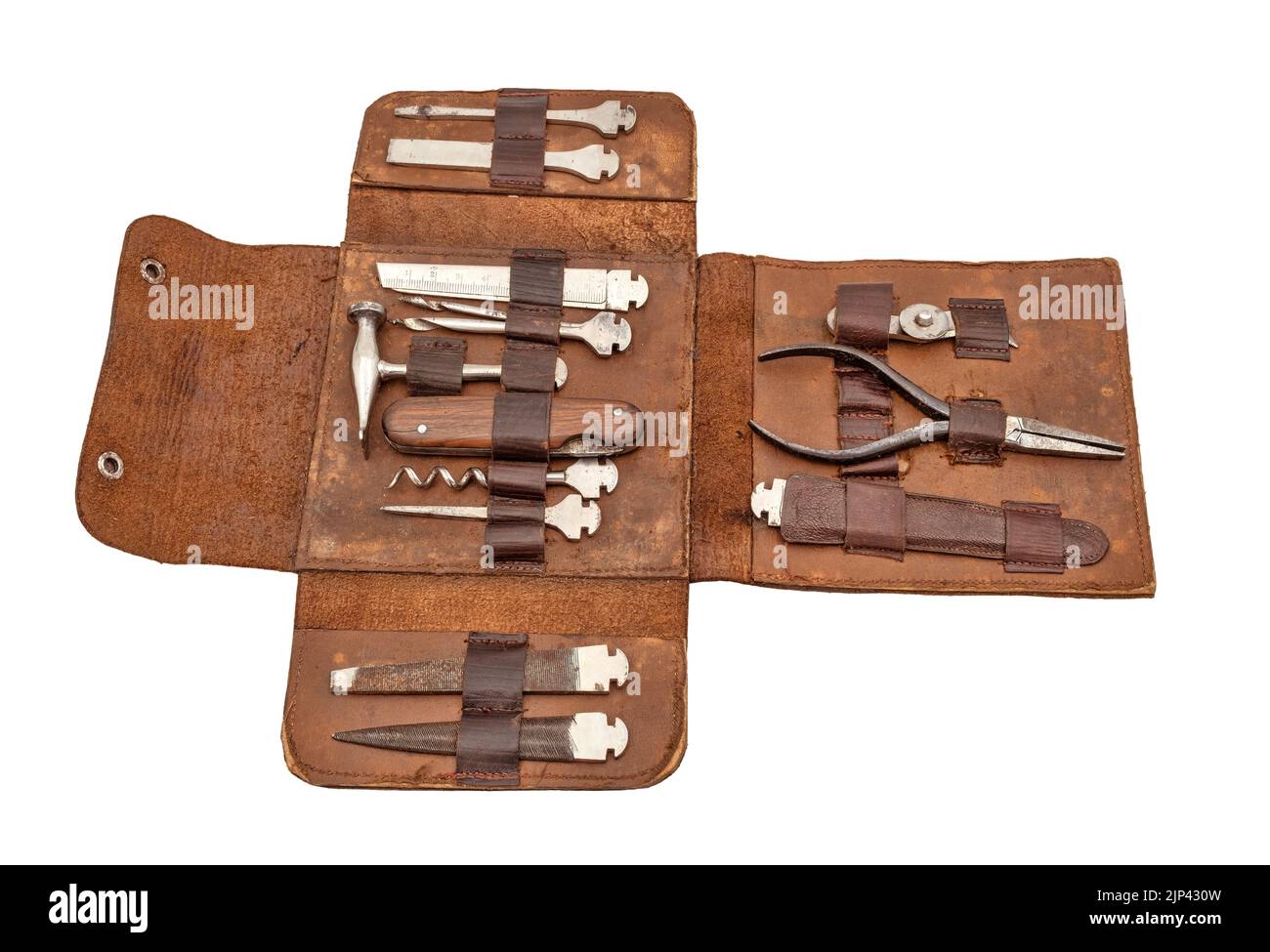 vintage tools from World War Two in leather case isolated on white ...
