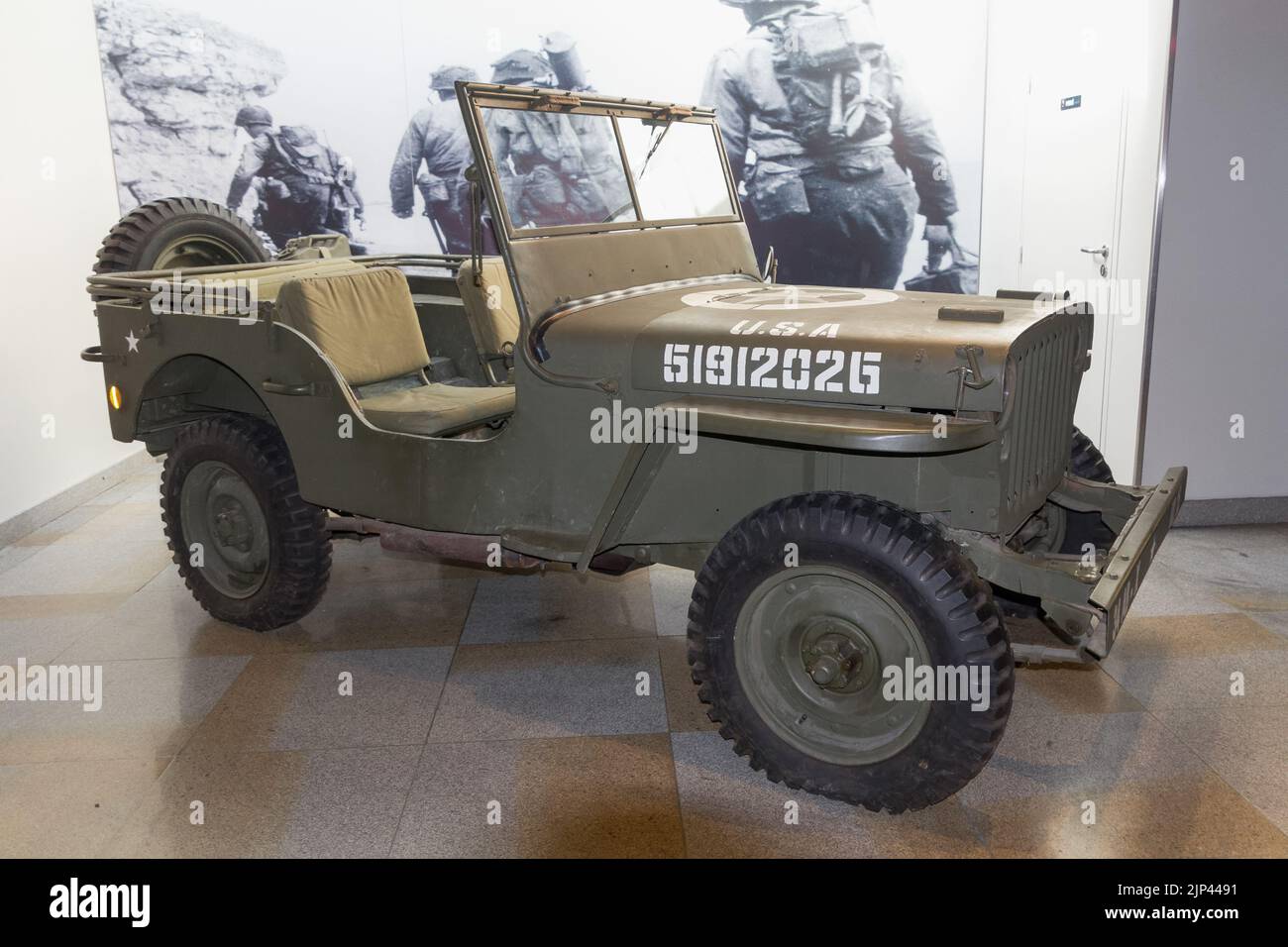 A closeup of an old iconic army Jeep, vintage Willys car in Normandy ...
