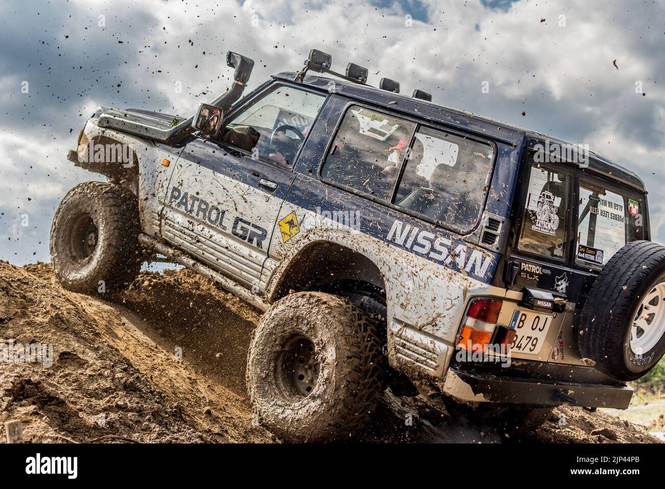 off-road Nissan Patrol GR car spinning in the mud Stock Photo - Alamy