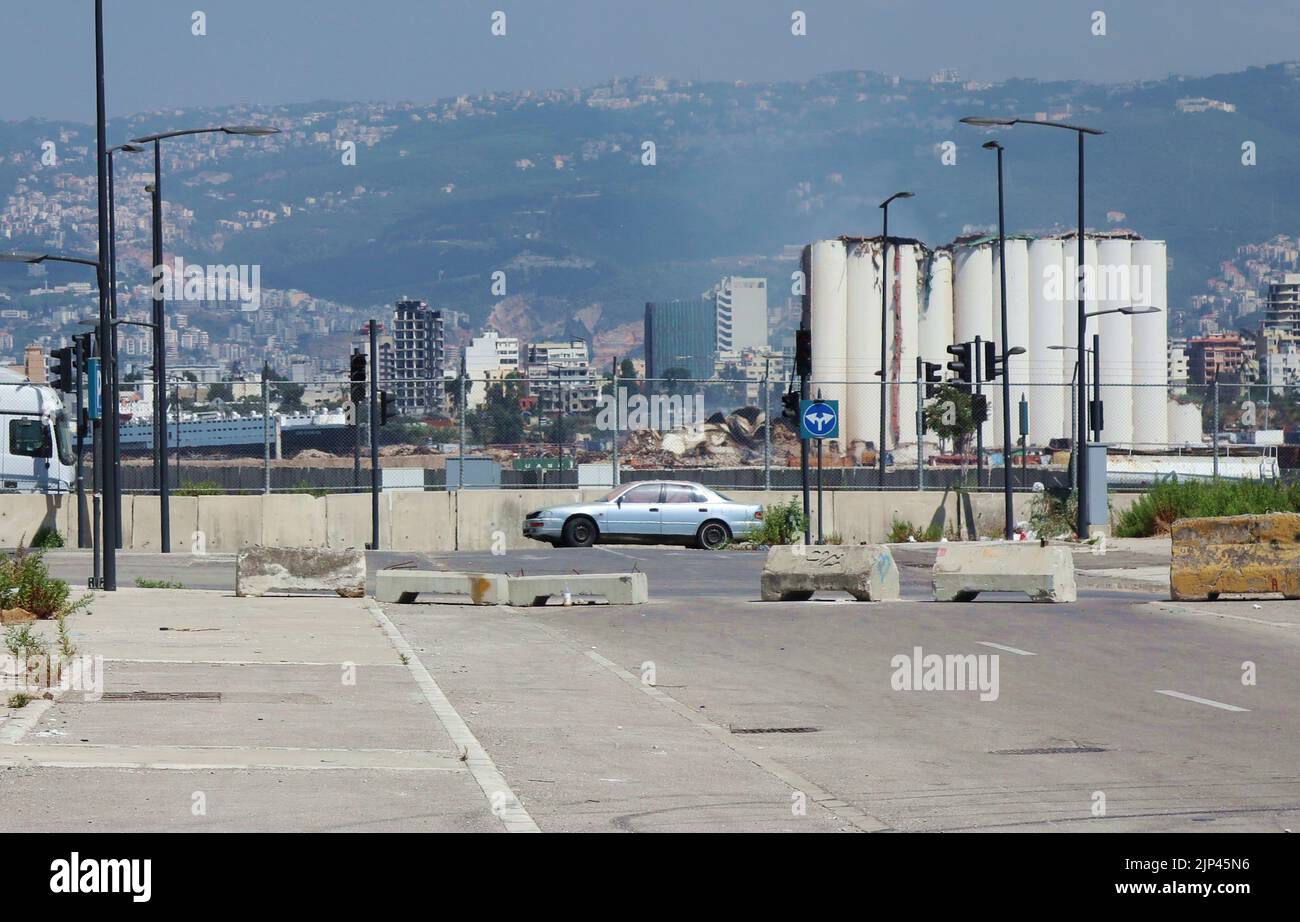 Smoke and fire come out from semi-destroyed grain silos at the port of ...
