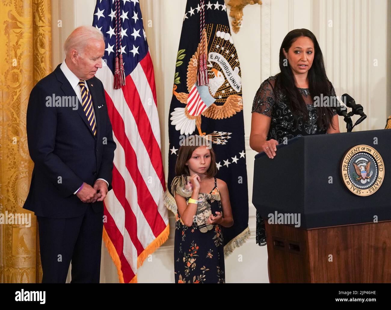 United States President Joe Biden and Brielle Robinson, surviving ...