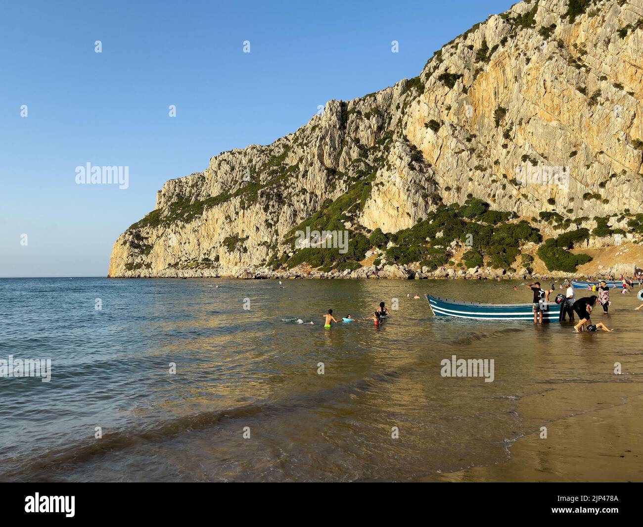 A group of people enjoying their summer holiday on the beach Stock ...