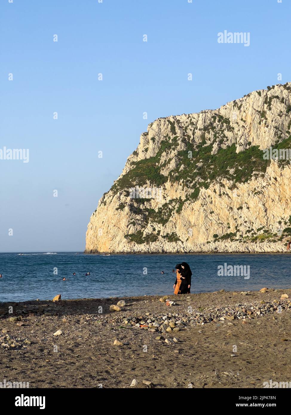 A group of people enjoying their summer holiday on the beach Stock ...