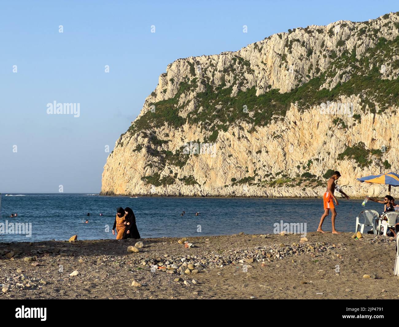 A group of people enjoying their summer holiday on the beach Stock ...