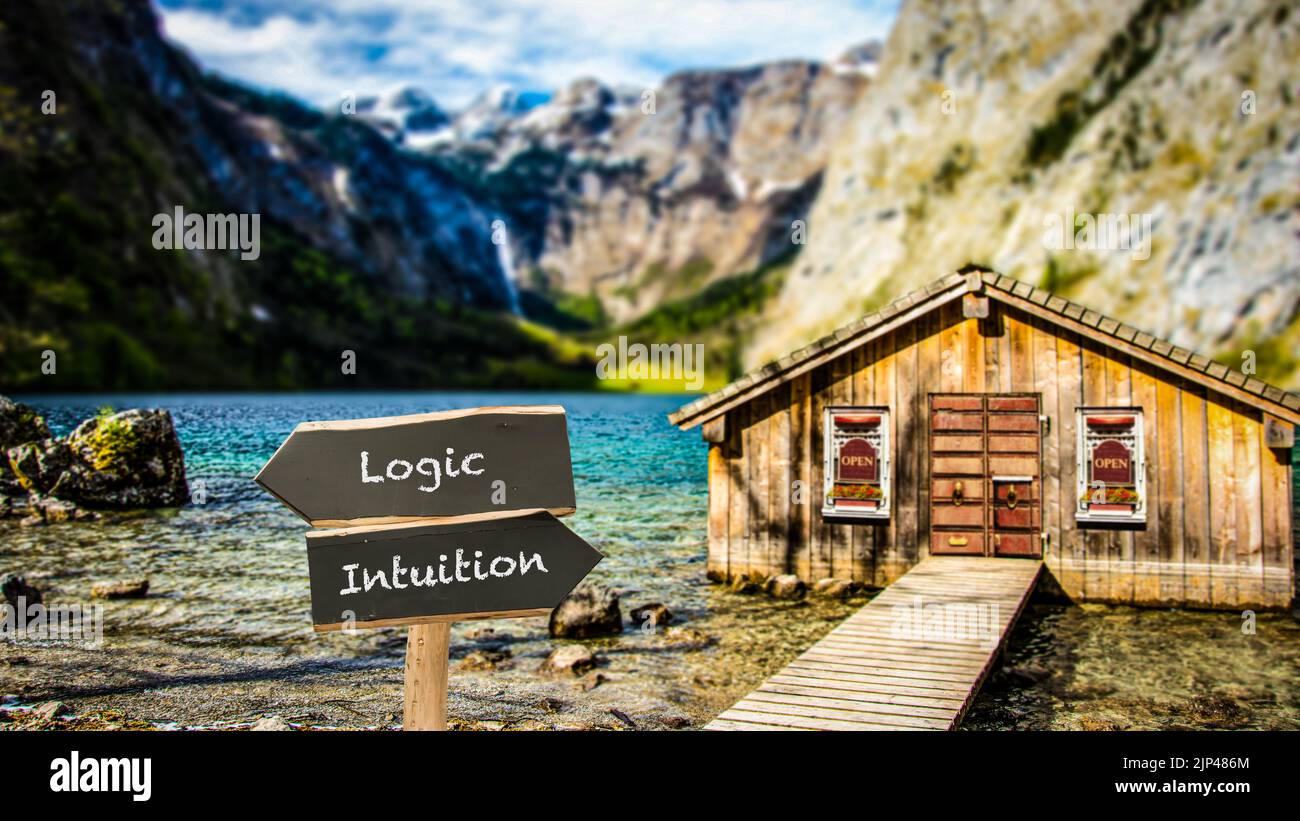 Street Sign the Direction Way to Intuition versus Logic Stock Photo - Alamy