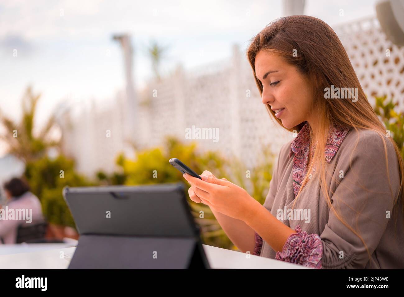 A Spanish businesswoman having breakfast in a restaurant Stock Photo ...