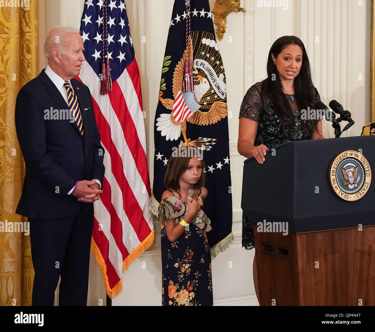 United States President Joe Biden and Brielle Robinson, surviving ...
