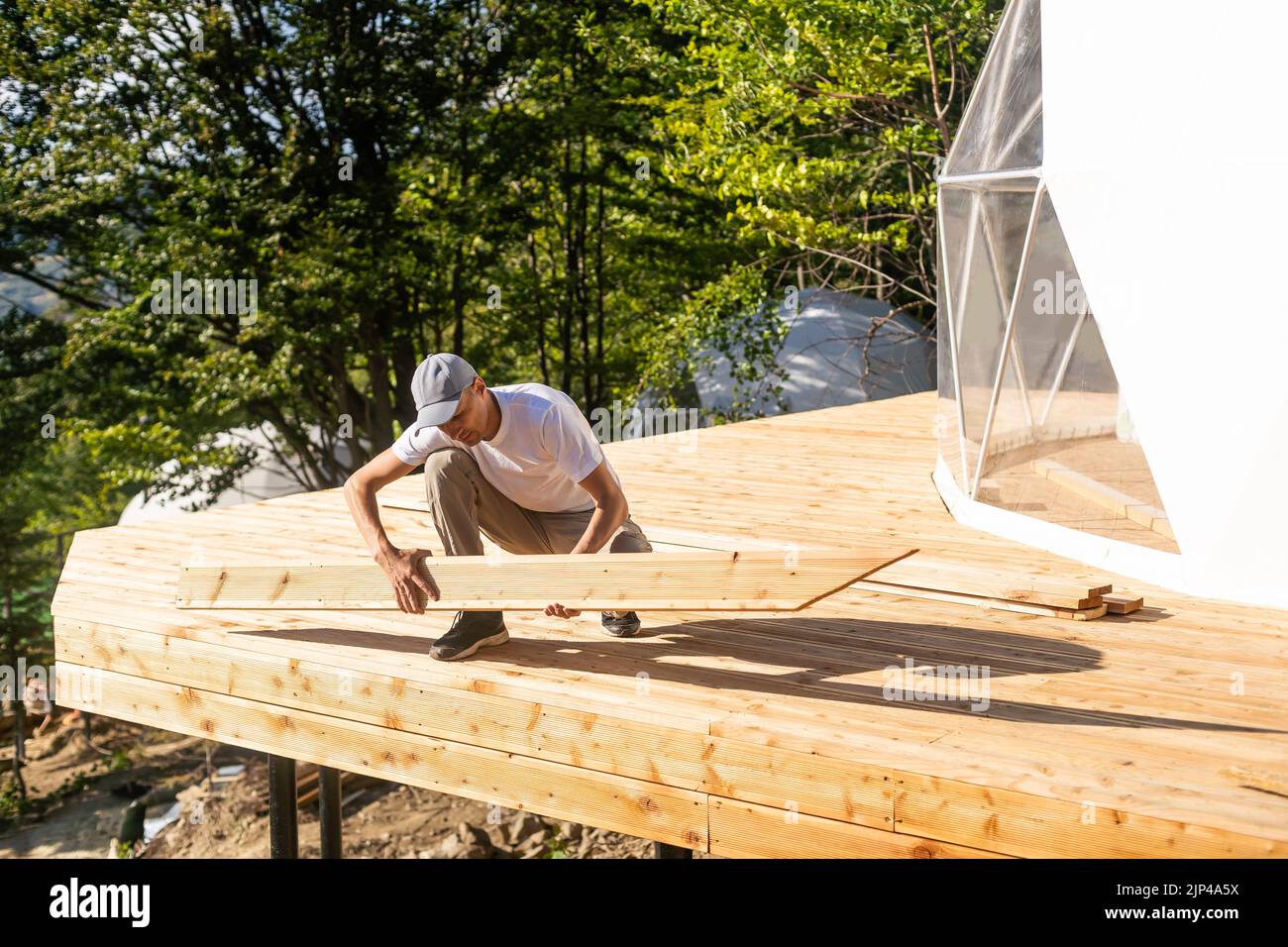 the master builds the dome. Outside spherical glamping dome ...