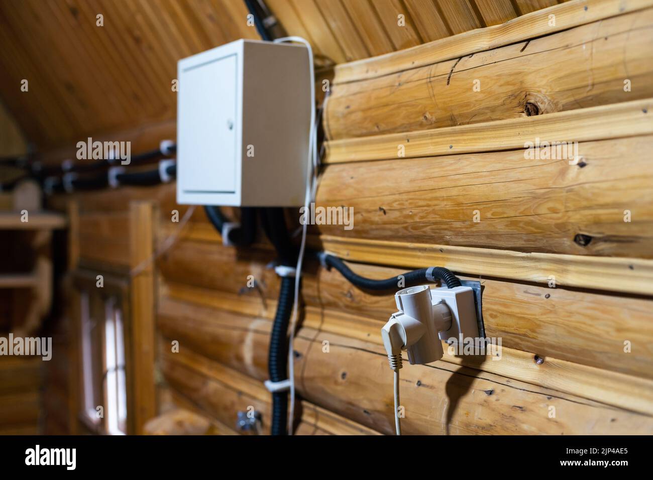 automatic fuses in electricity distribution box (fusebox) inside wooden ...