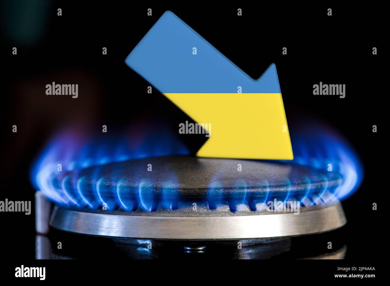 Decreased gas supplies in Ukraine. A gas stove with a burning flame and ...