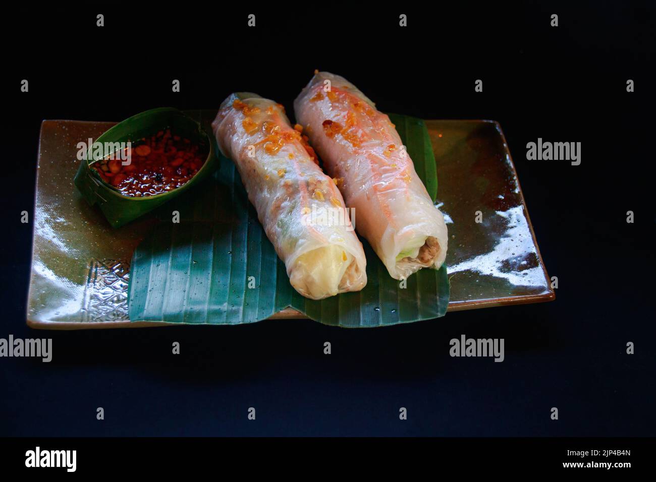 Khmer fresh rice paper spring rolls called num naem chhao served in a ...
