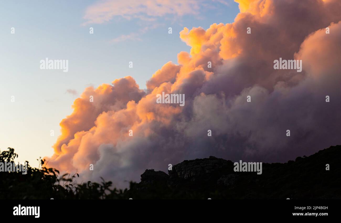 Cumulus and Stratus clouds in dramatic sunset sky over Cape Town Stock ...