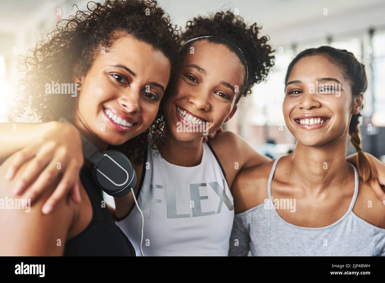 Friends dont let friends skip gym day. a group of happy young women ...