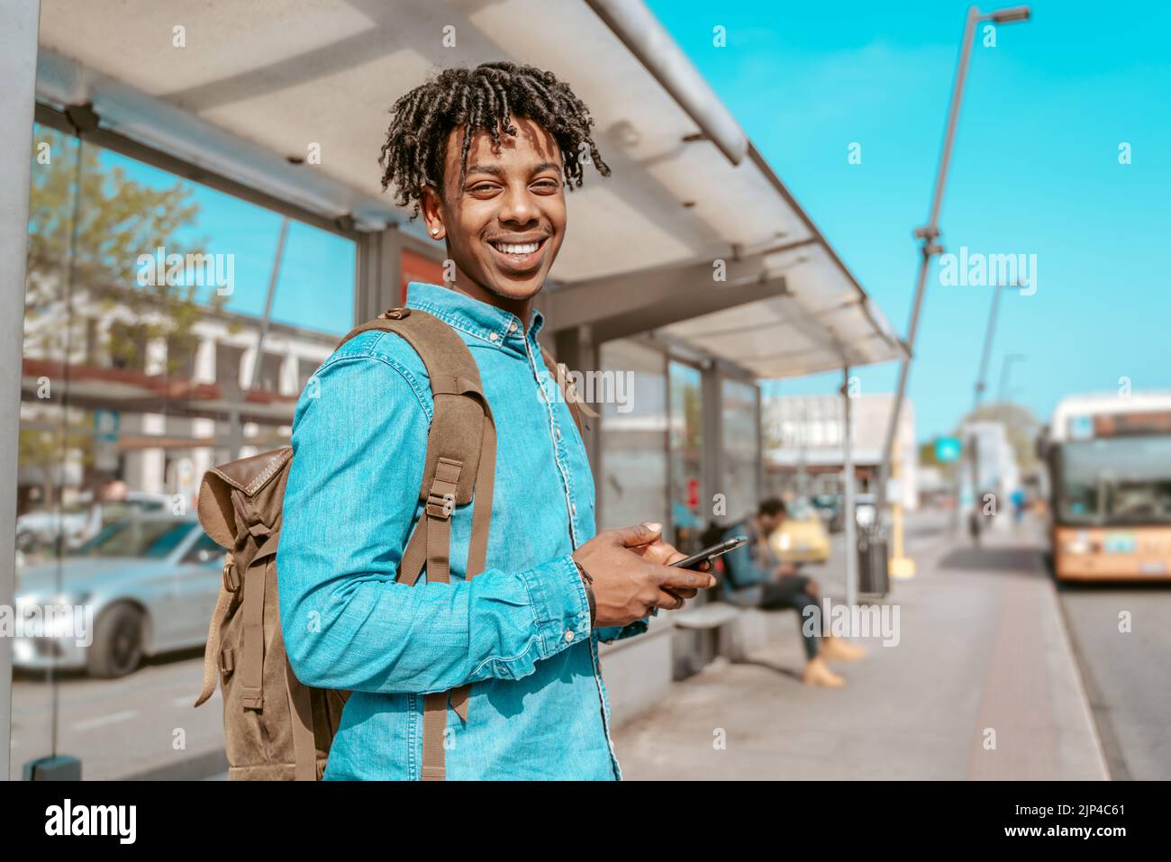African guy looking sideways hi-res stock photography and images - Alamy