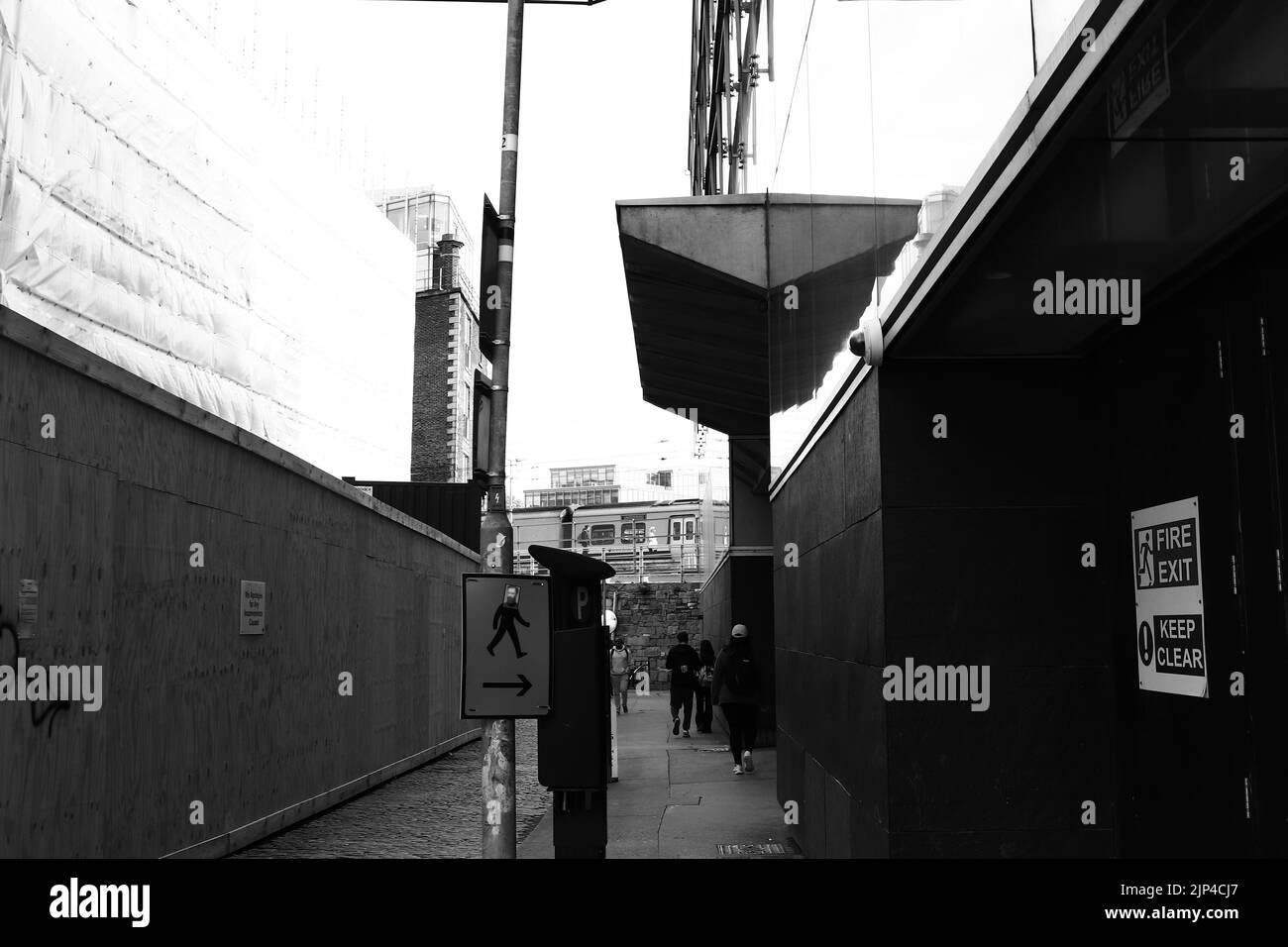 The 'Pedestrians this way' sign on the street Stock Photo - Alamy