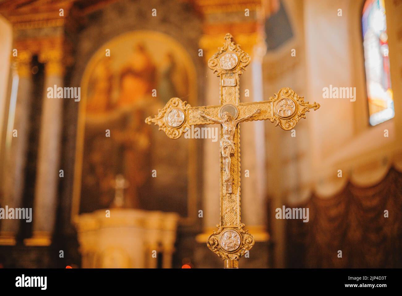 A close-up shot of Jesus Christ on a cross in a blur Stock Photo - Alamy