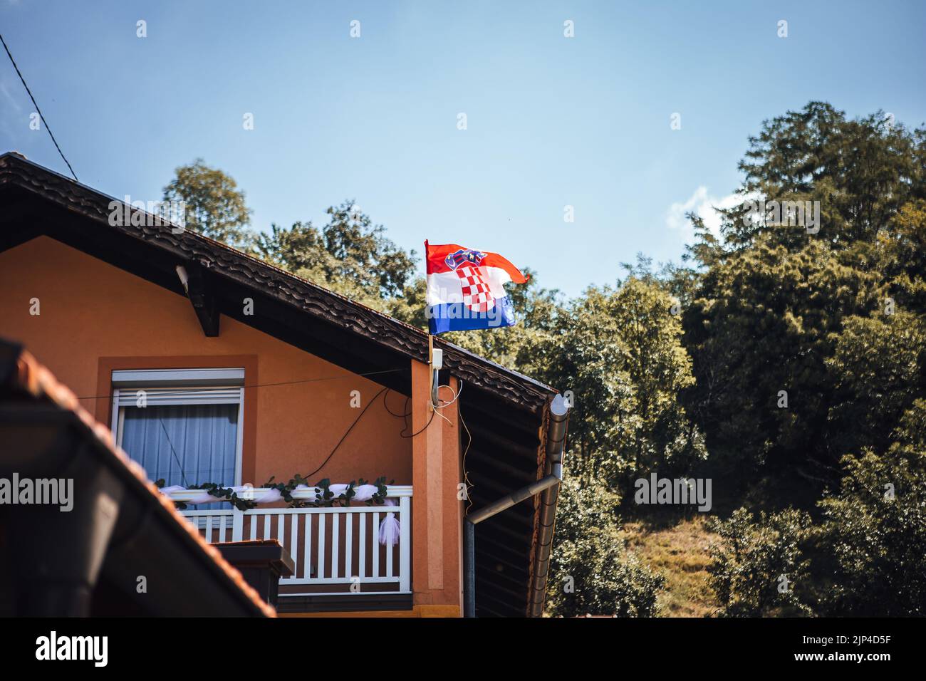The flag of Croatia on a building rooftop Stock Photo - Alamy