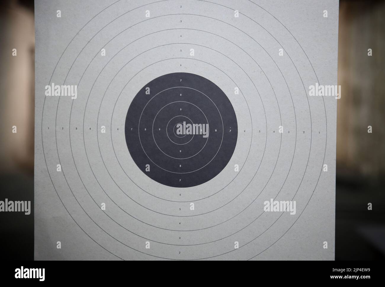 Pistol bullseye target training in a shooting club closeup Stock Photo ...
