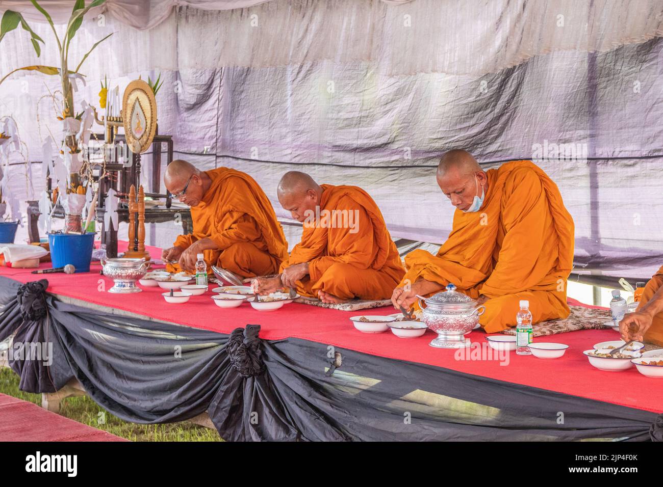 Food offering or food donation to Thai monks as part of a religious and ...