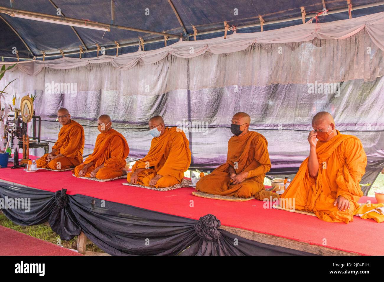 Food offering or food donation to Thai monks as part of a religious and ...