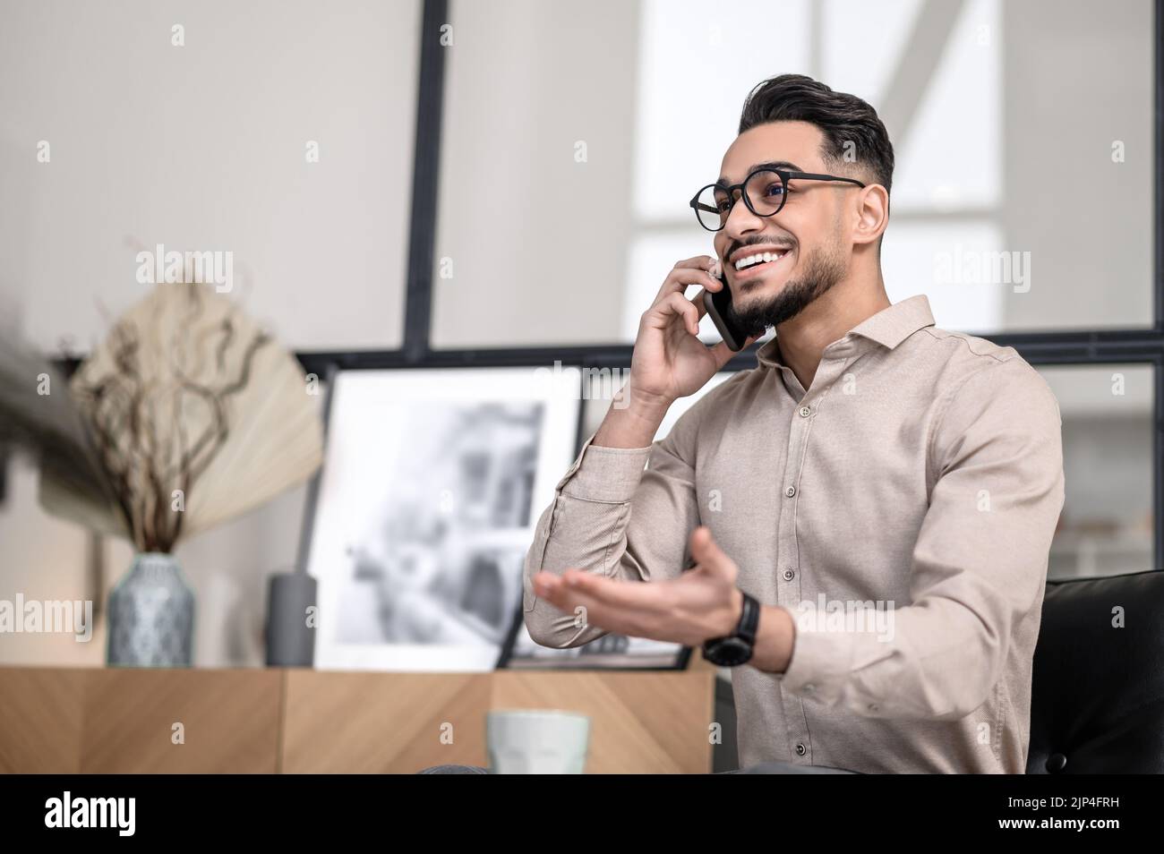 Elegant man laptop talking hi-res stock photography and images - Alamy