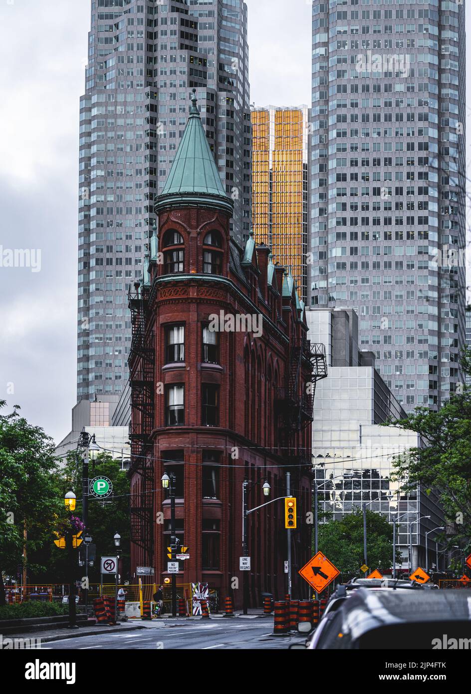 A vertical shot of the Gooderham building in Downtown Toronto with ...