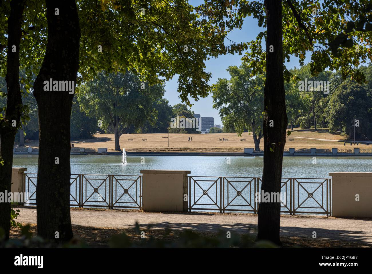 People cooling down near artificial lake in Cologne on a warm summer ...
