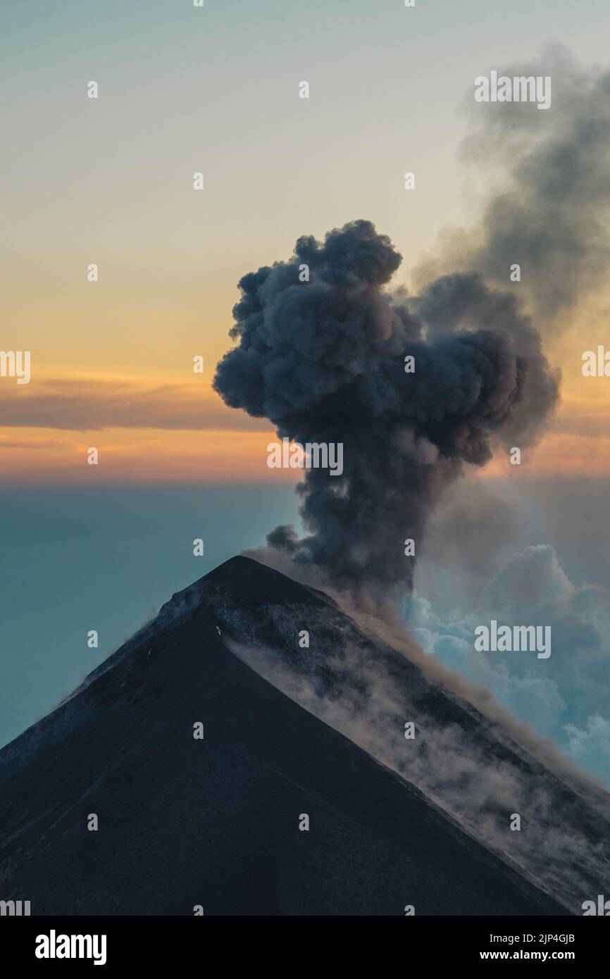 A small eruption of Volcan de Fuego leaves a small fumarole Stock Photo ...