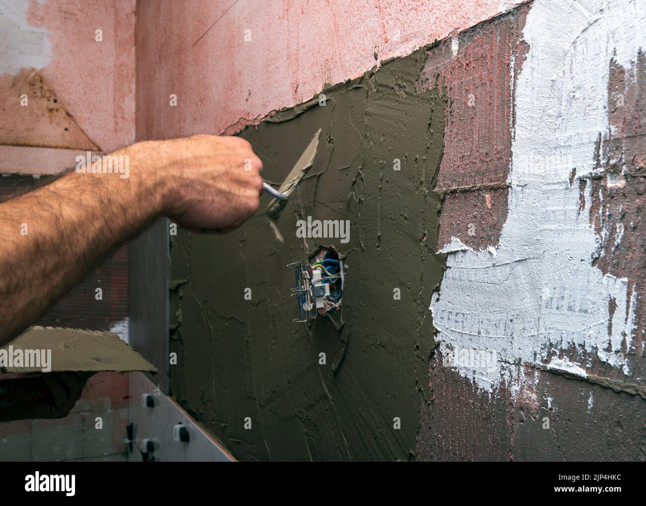 Using trowels hi-res stock photography and images - Alamy