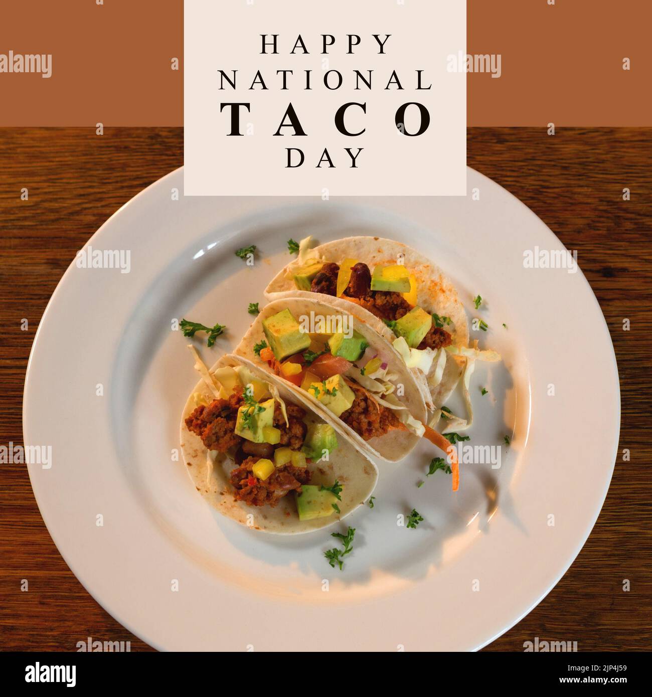 Composition of happy national taco day text with tacos on table ...
