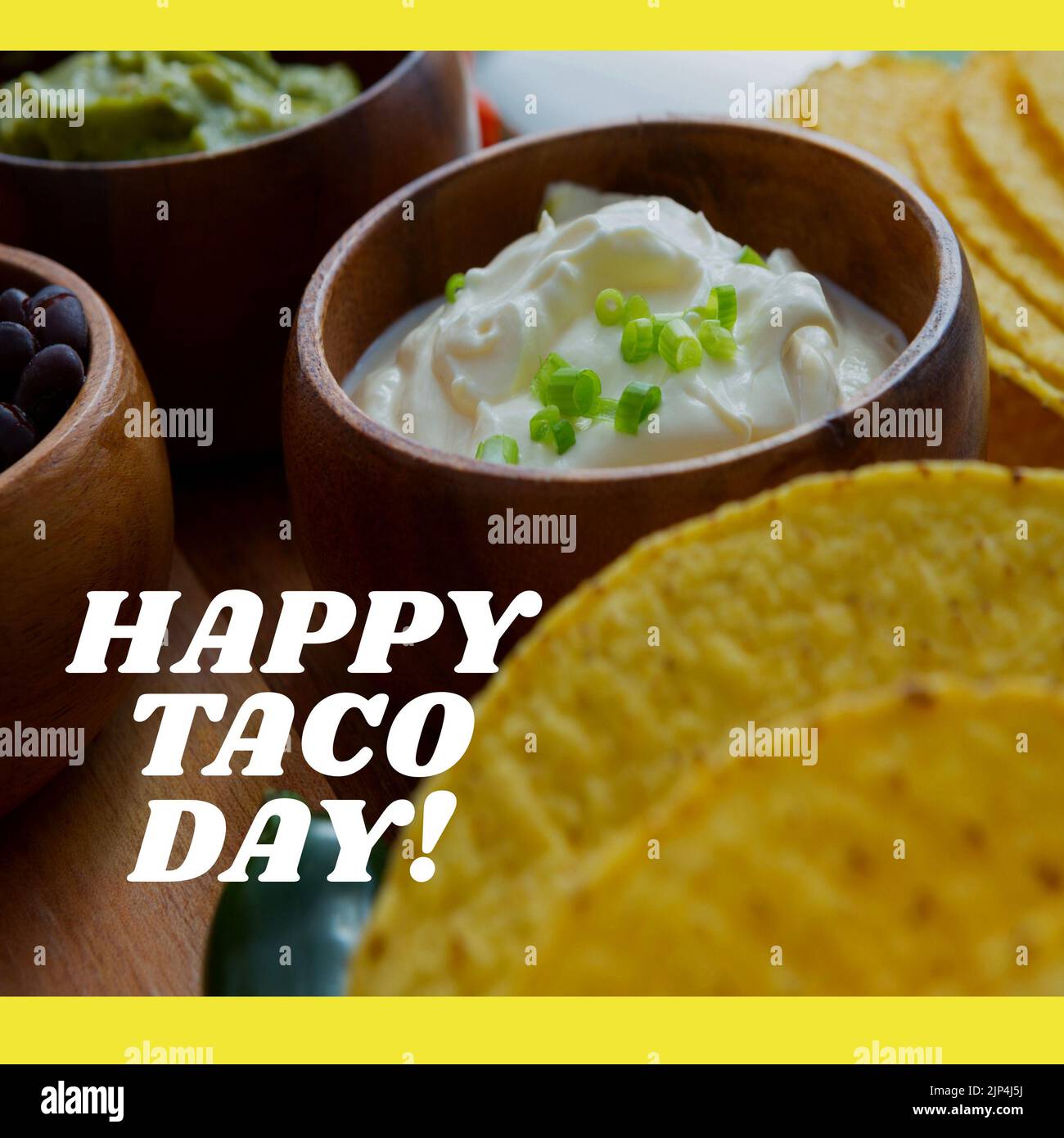 Composition of happy taco day text with tacos on table. National taco ...