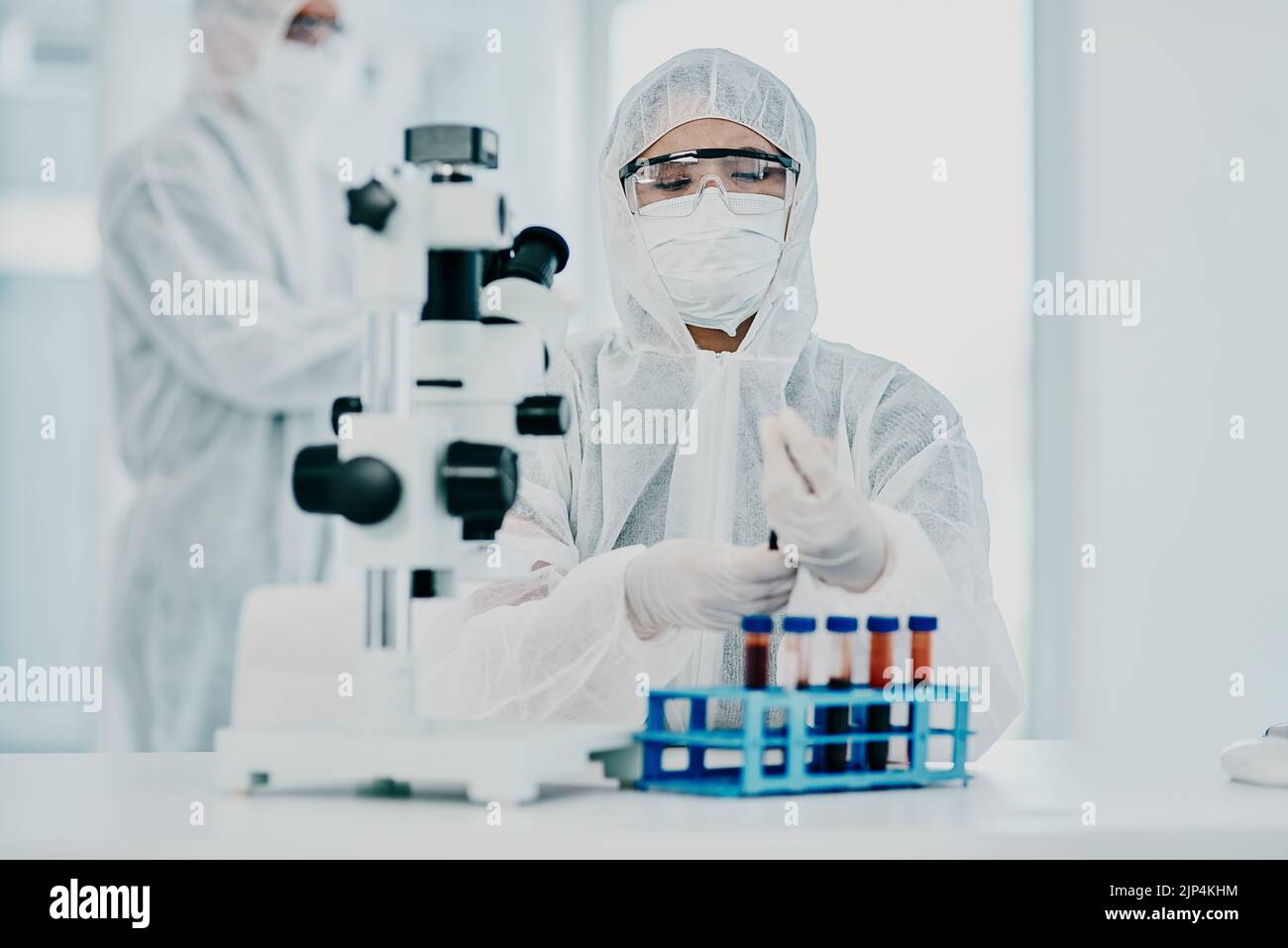 Scientist conducting an experiment hi-res stock photography and images ...