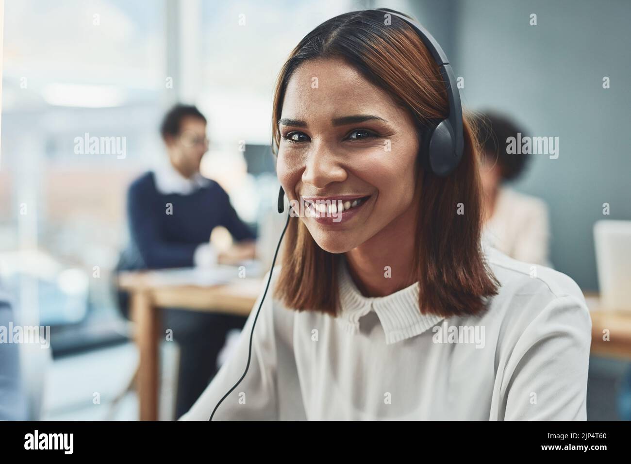 Portrait female sales assistant using hi-res stock photography and ...