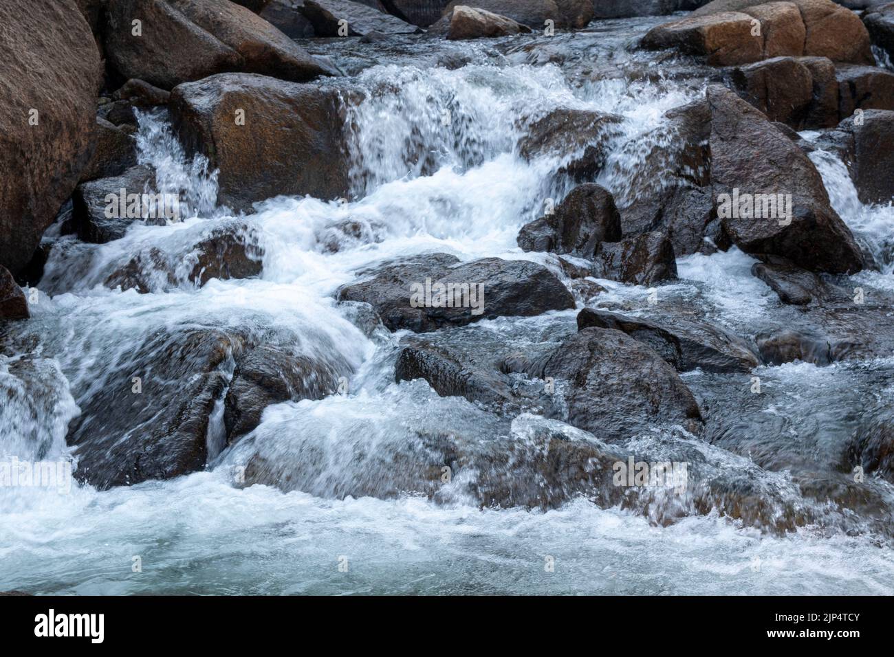 Tuolumne Falls is one of many waterfalls along the Tuolumne River in ...