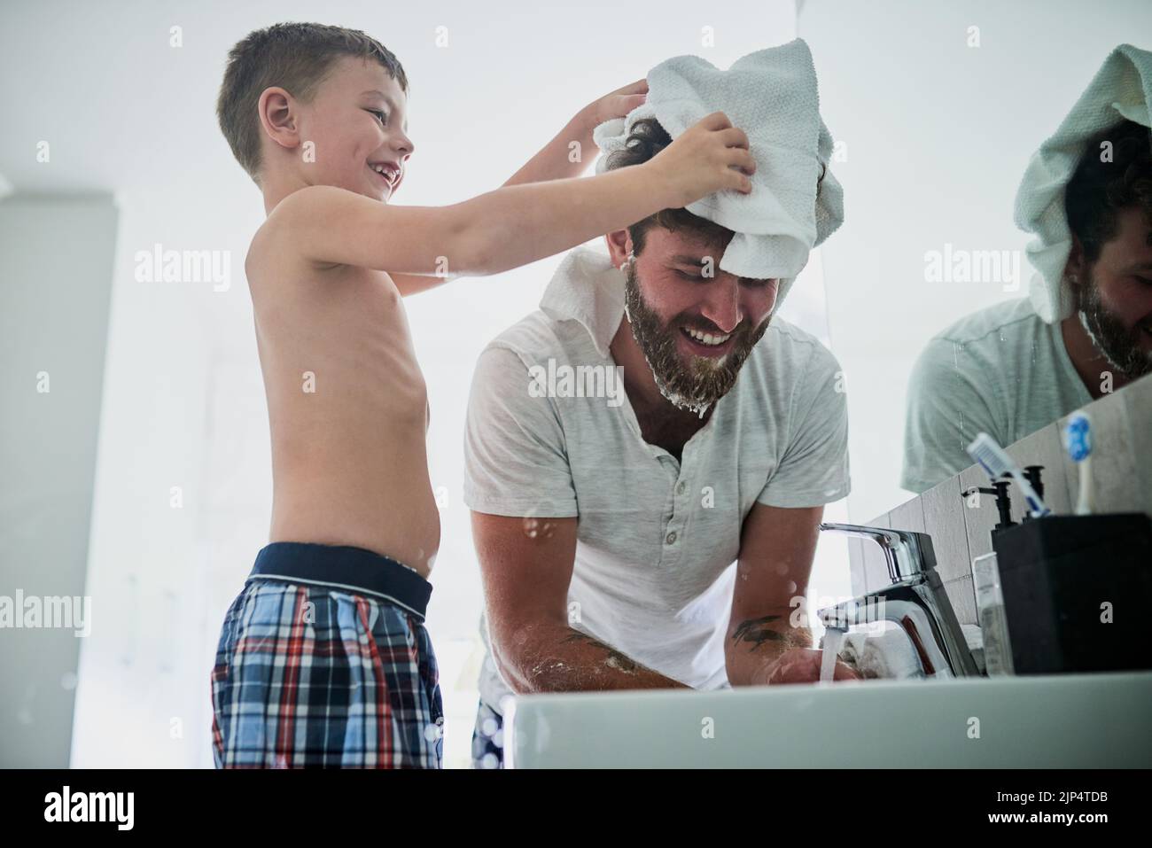 Boy wiping hi-res stock photography and images - Alamy