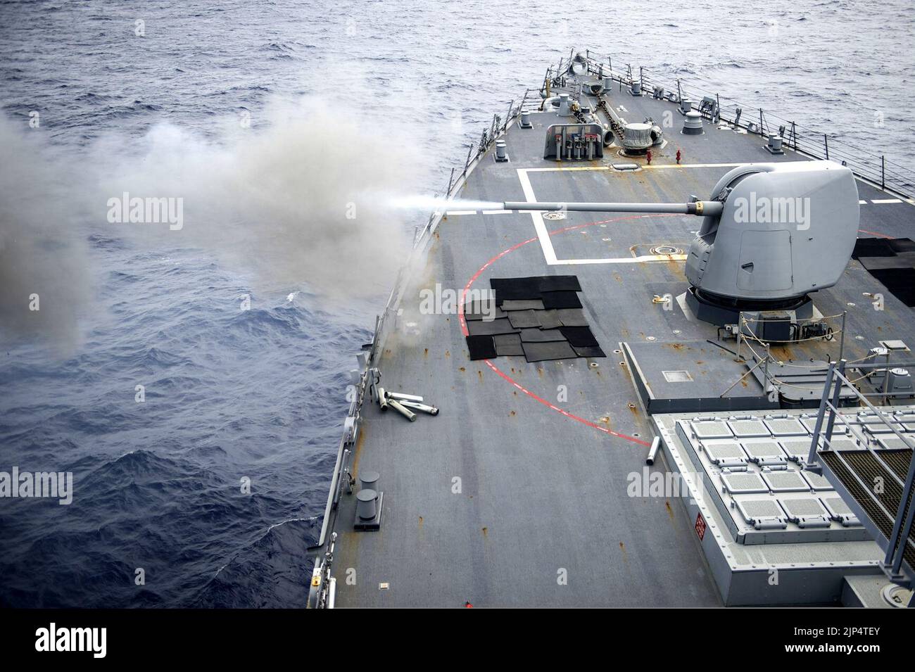 The guided missile destroyer USS John S. McCain (DDG 56) fires a Mark ...