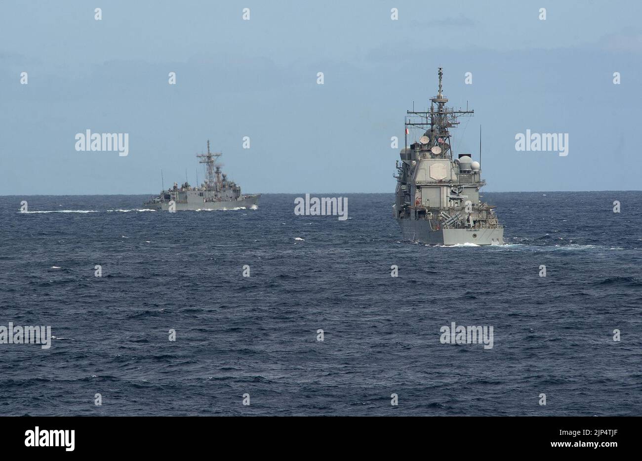 The guided missile frigate USS Samuel B. Roberts (FFG 58) and the ...