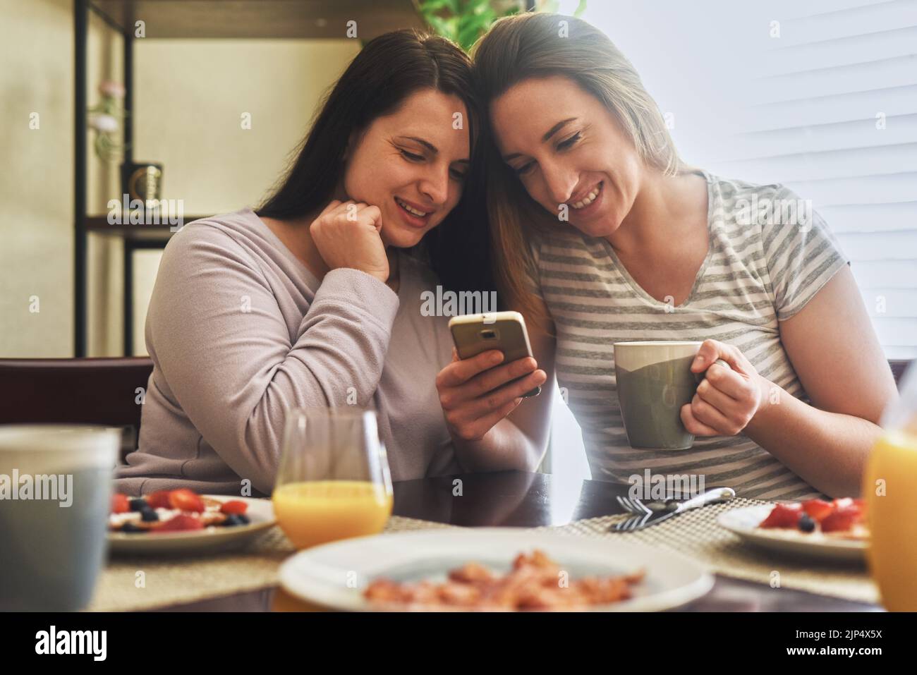 Women helping each other hi-res stock photography and images - Alamy