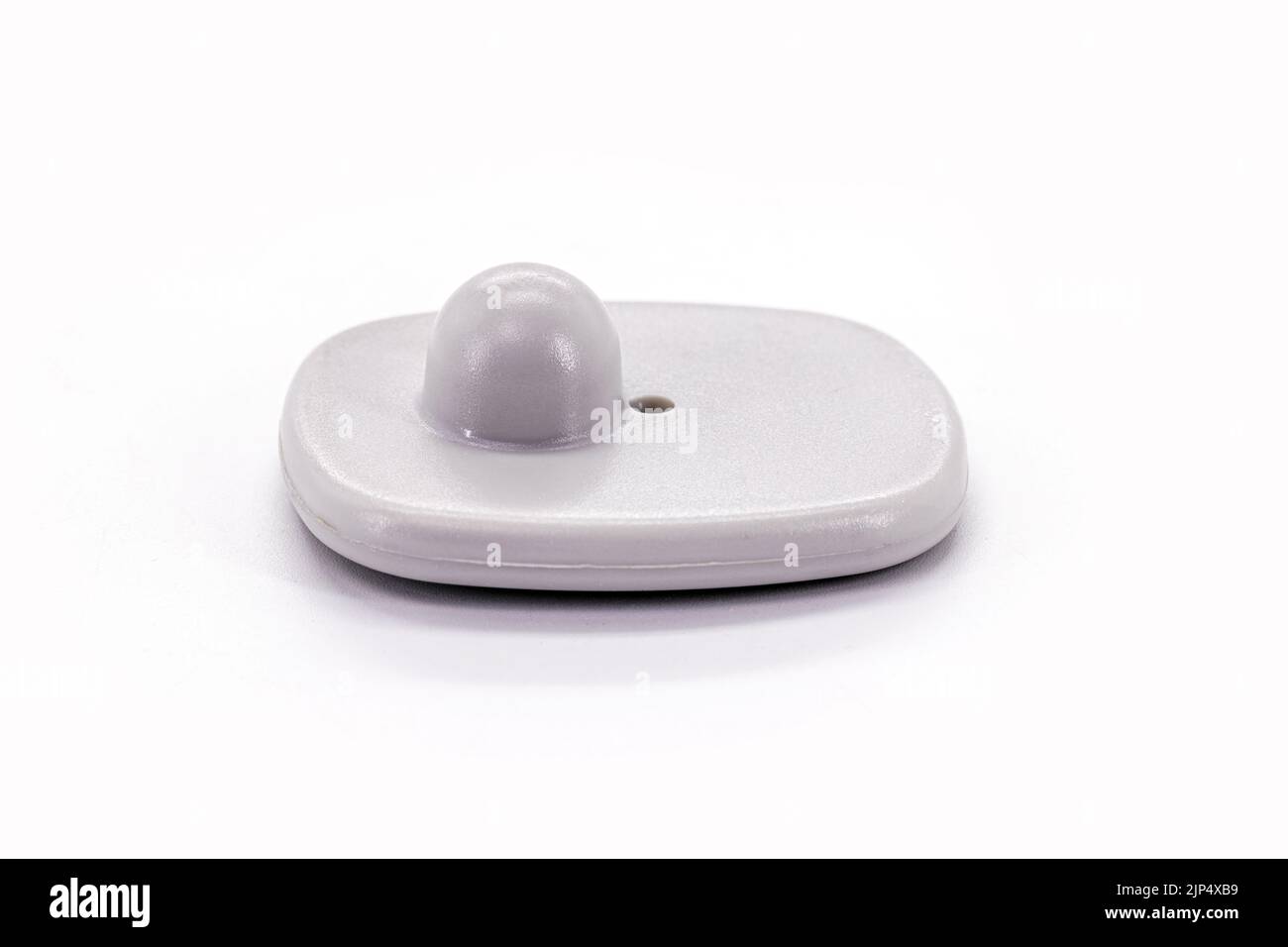 Anti-theft device used in commerce, tag or anti-theft tag on isolated ...