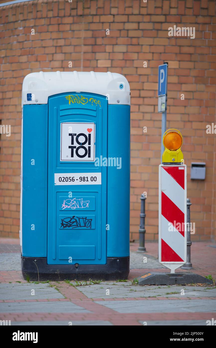 a mobile toilet for construction workers in the city Stock Photo - Alamy