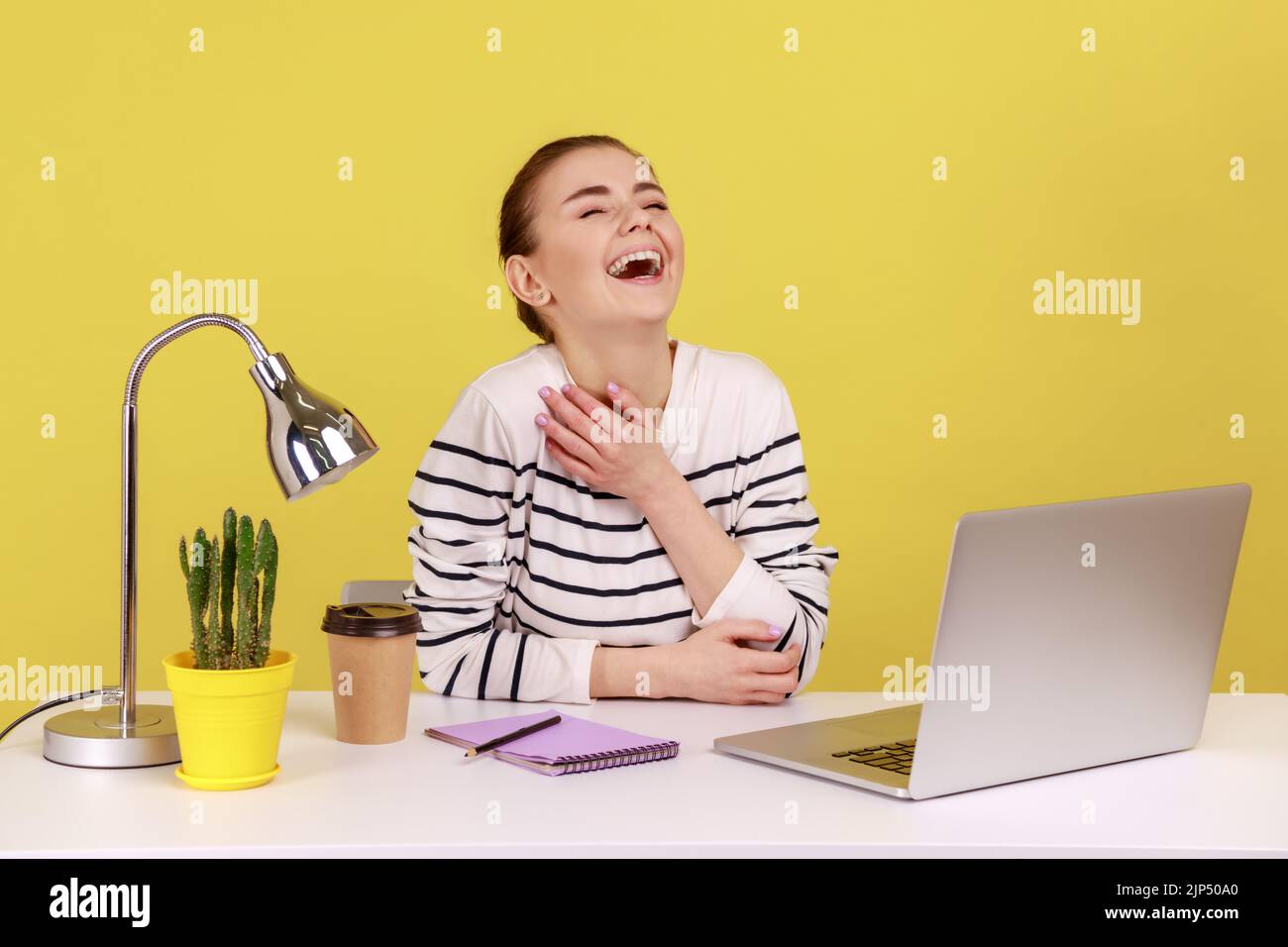Amused happy woman employee laughing out loud, being hysterical at ...